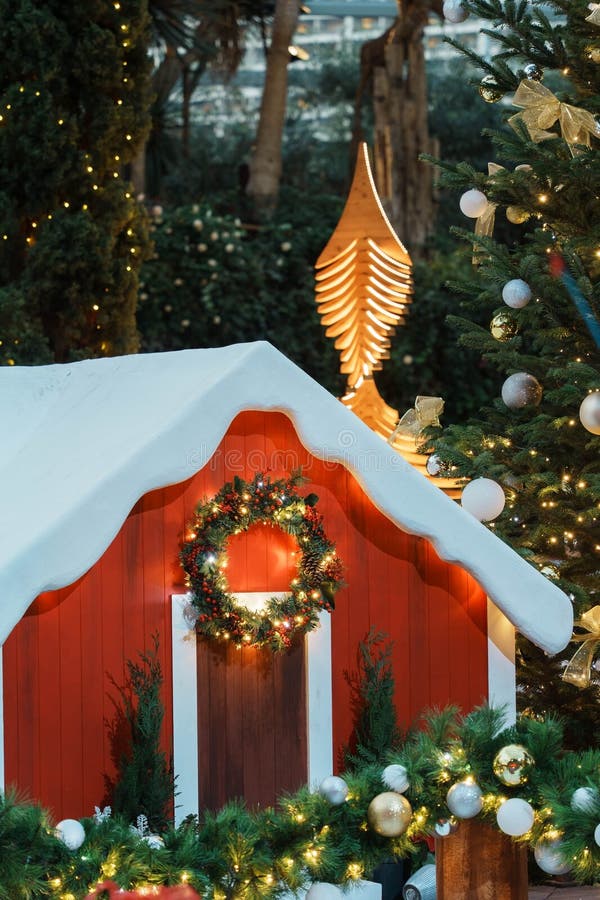 Cheerful Winter Scene Featuring a Snowman in Front of a Red House Stock ...