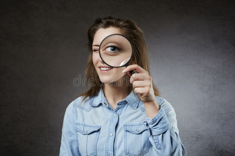 Cheerful Woman Looking through Magnifying Glass Stock Image - Image of ...