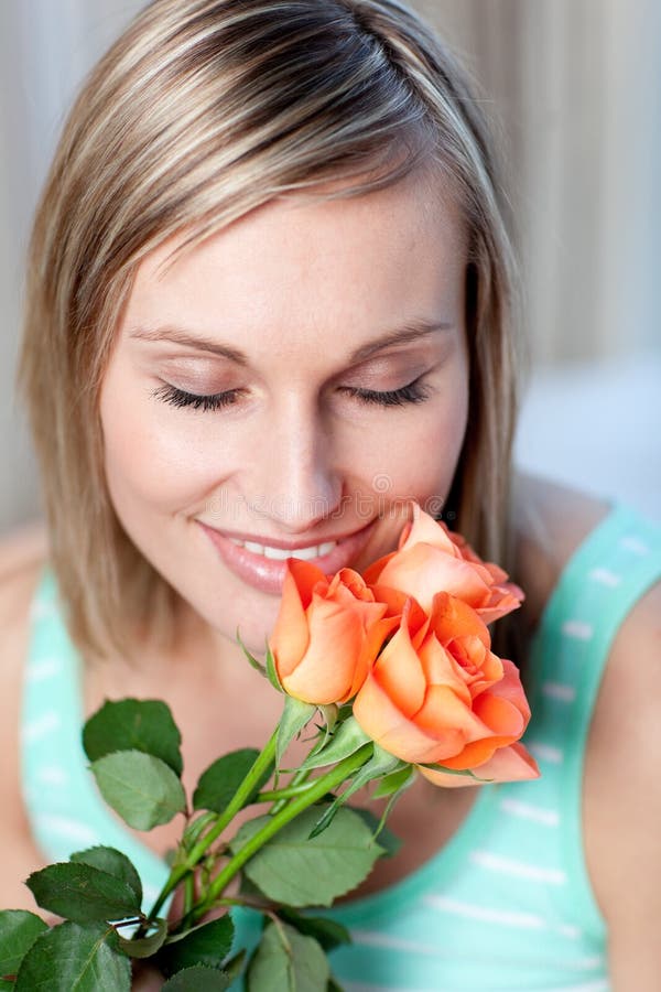 Smelling red roses stock image. Image of profile, roses - 1412041