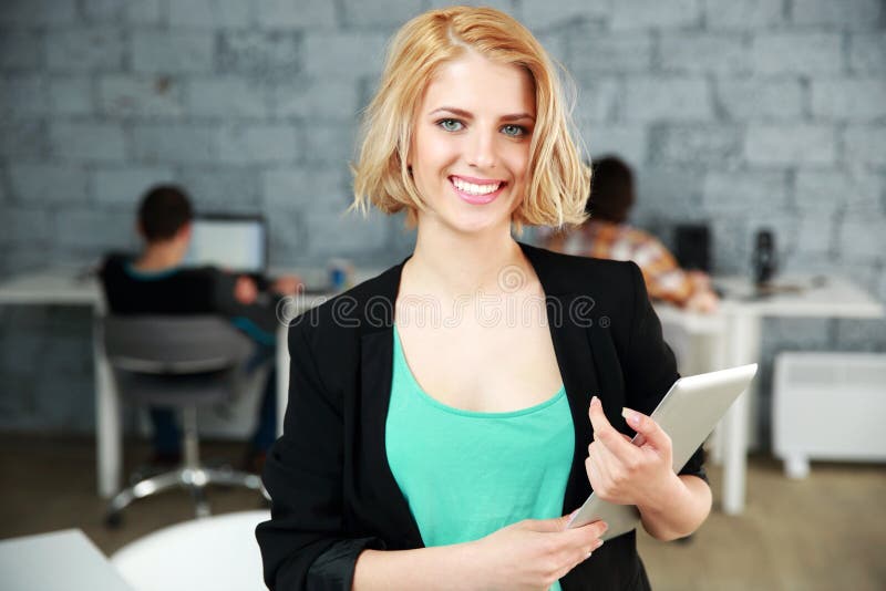 Cheerful Woman Standing with Tablet Computer Stock Photo - Image of ...