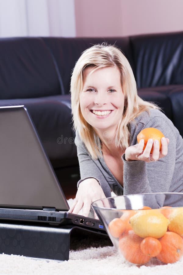 Cheerful Woman Using a Laptop at Home. Stock Photo - Image of lifestyle ...