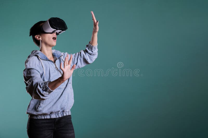 Cheerful Woman Wearing Virtual Reality Headset in Front of Camera Stock ...