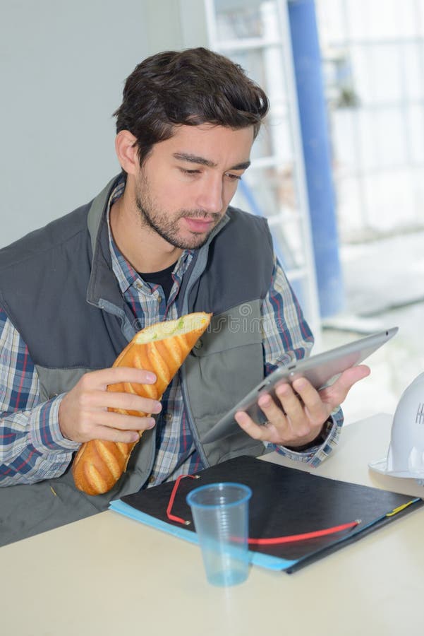 Cheerful Worker Having Lunch Stock Image - Image of people, engineer ...