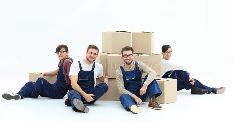 Cheerful Workers with Stacked Boxes Isolated on White. Stock Photo ...