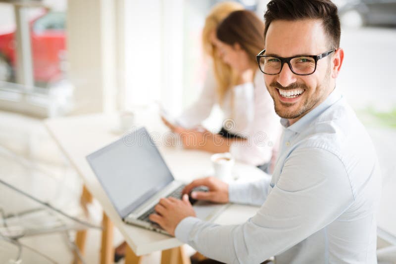 Workteam in Office Working Together on Laptop Stock Image - Image of ...