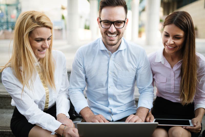 Workteam in Office Working Together on Laptop Stock Image - Image of ...