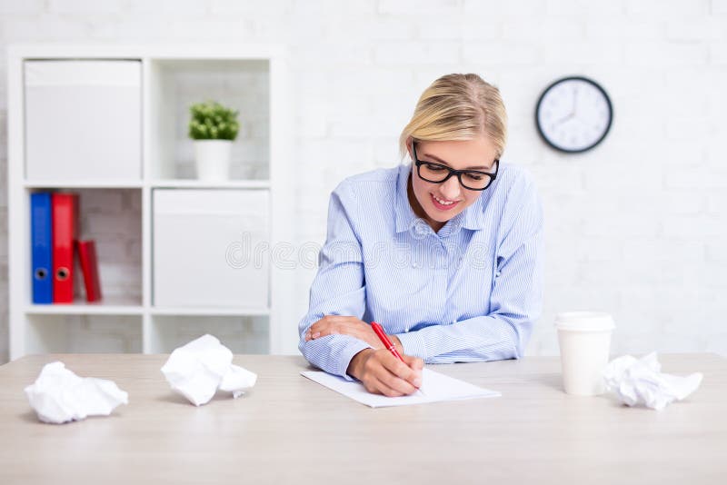 Cheerful Young Beautiful Woman Writing Something Stock Image - Image of ...