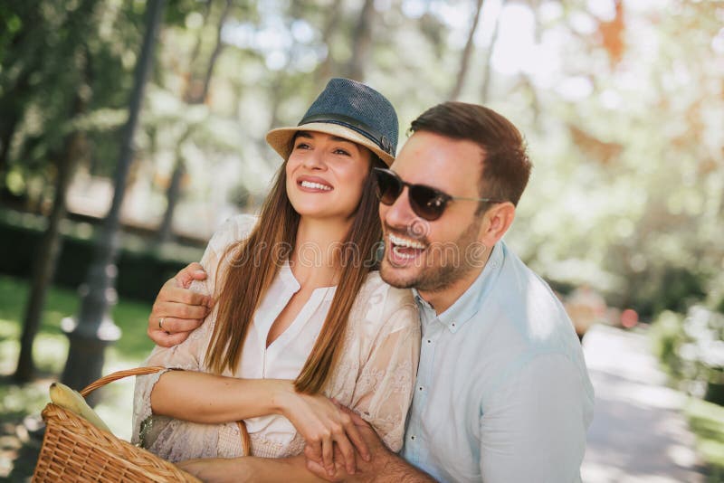 Young Couple Having Fun and Laughing Together Outdoors Stock Photo ...
