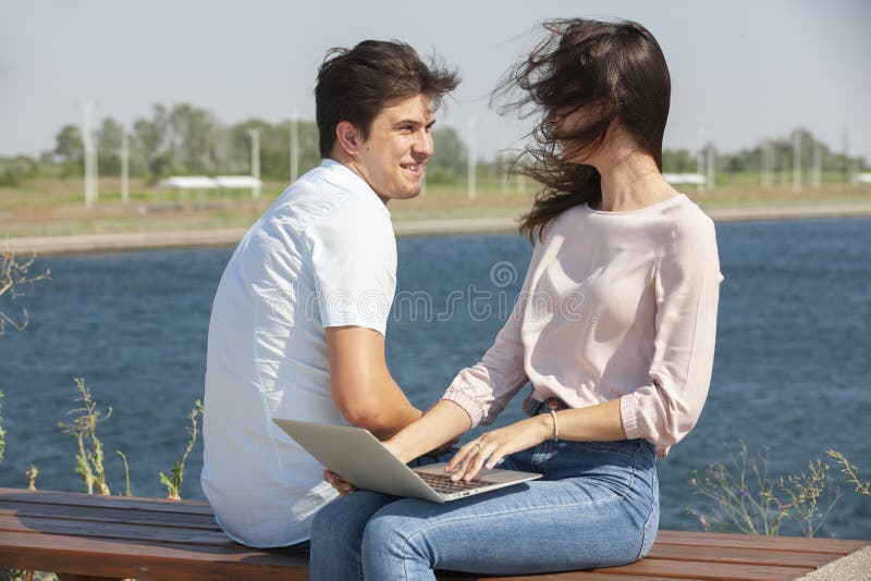Cheerful Young Couple Spending Fun Time at the Park Stock Photo - Image ...