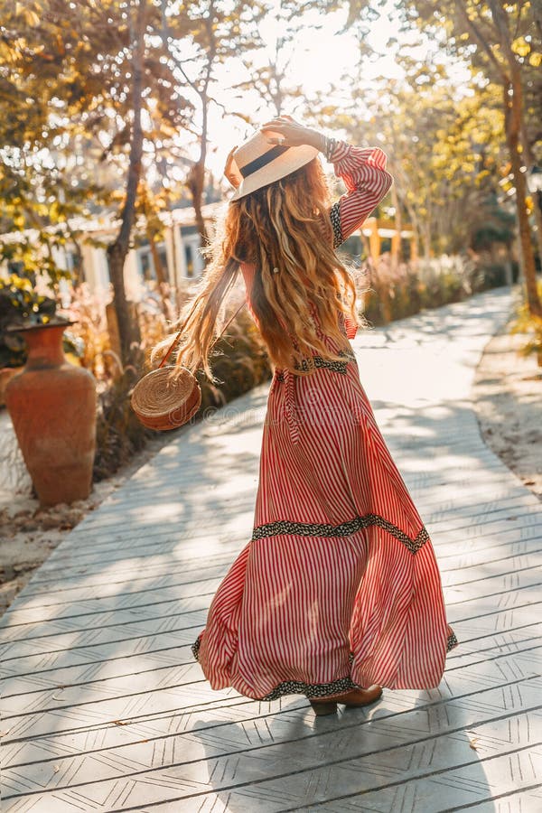 Cheerful Young Woman Having Fun On The Beach At Sunset Stock Image