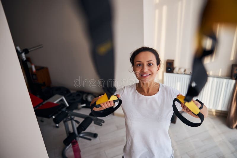 Cheerful Young Female Athlete Doing Resistance Training Stock Photo ...