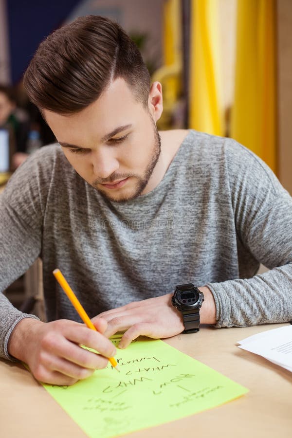 Cheerful Young Guy is Studying with Concentration Stock Image - Image ...