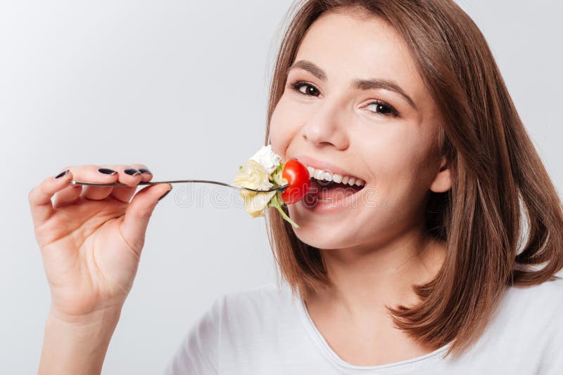 Cheerful Young Lady Eating Salad Stock Photo - Image of lifestyle ...