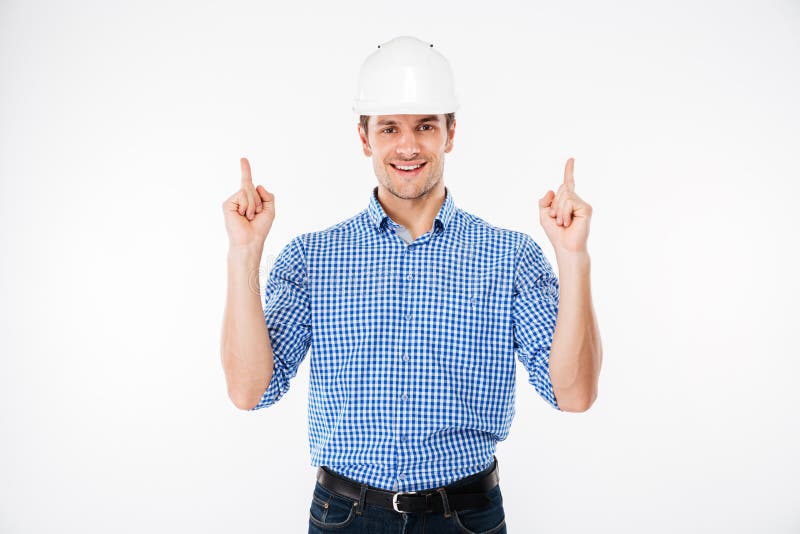 Cheerful Young Man Builder in Hard Hat Pointing Up Stock Image - Image ...