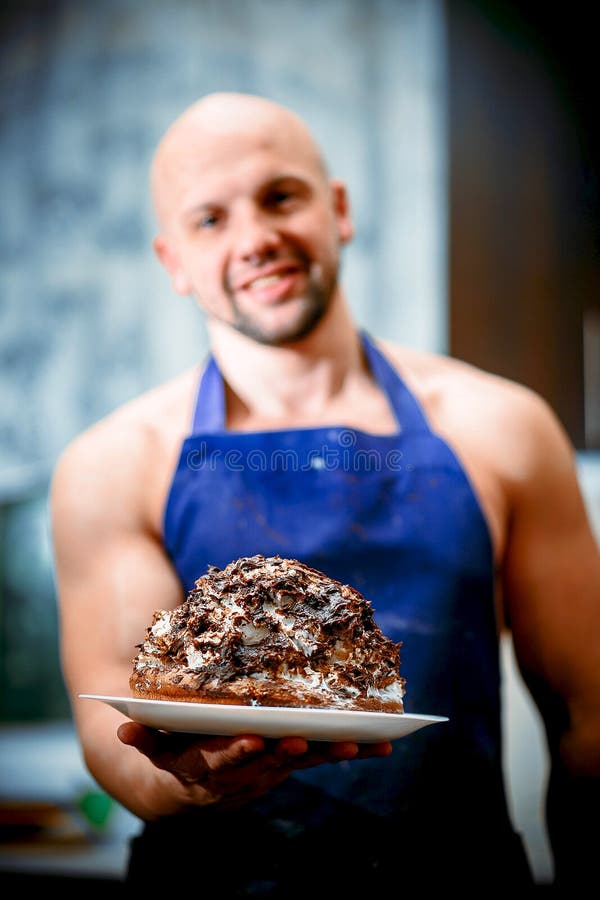 Cheerful Young Man with a Cake Stock Photo - Image of lunch, delivery ...