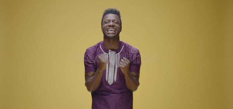 Cheerful Young Man Celebrating Stock Image - Image of delighted ...