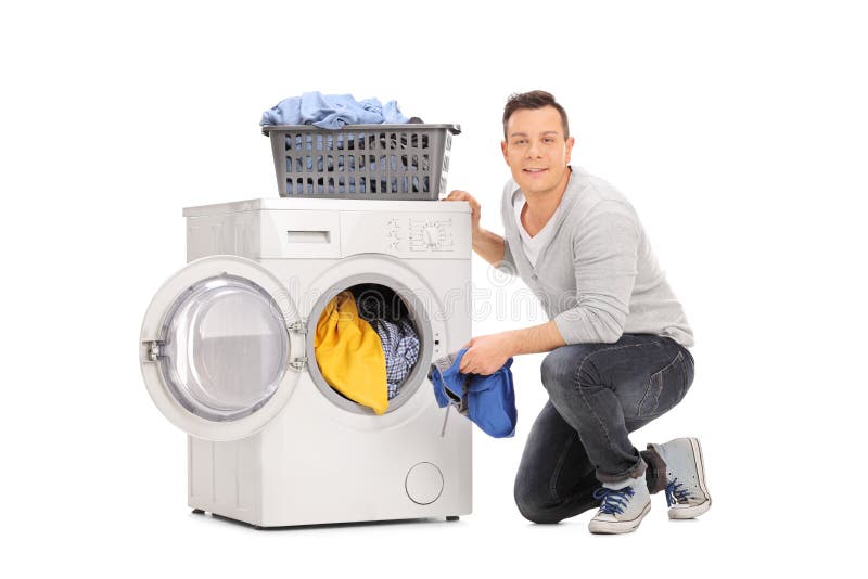 Cheerful Young Man Doing Laundry Stock Image - Image of confidence ...