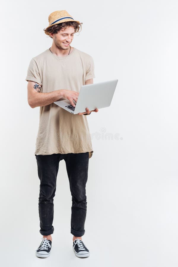 8,509 Standing Handsome Man Using Laptop Stock Photos - Free & Royalty ...