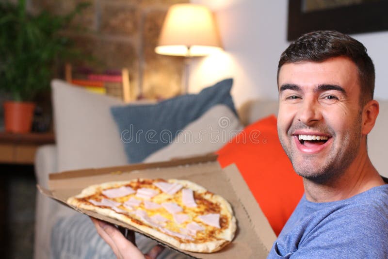 Cheerful Young Man Holding a Pizza Stock Image - Image of funny, heart ...