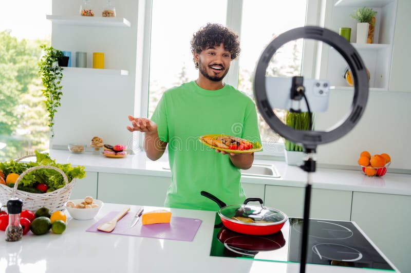 Young Man Preparing Delicious Homemade Cuisine while Filming a Cooking ...