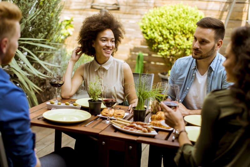 Cheerful Young People Have Lunch in Courtyard and Have Fun Stock Image ...