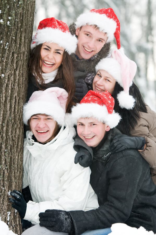 Cheerful Young People in Rad Hats Stock Image - Image of laugh, smiling ...