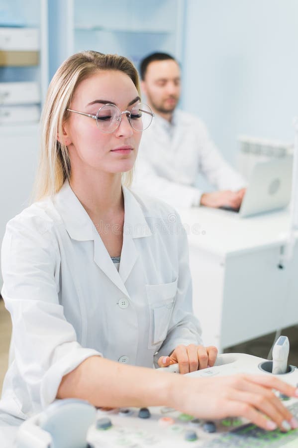 Cheerful Young Researchers are Working in Lab Stock Image - Image of ...