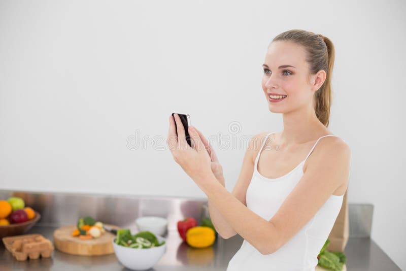 Cheerful Young Woman Sending a Texting Stock Image - Image of pretty ...