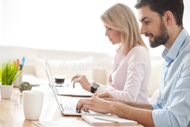Cheerful Young Workers are Using Modern Computers Stock Image - Image ...