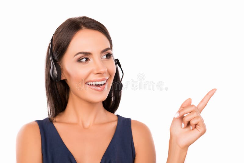 Cheerfull Assistant with Headset Smiling and Pointing with Finger Stock ...