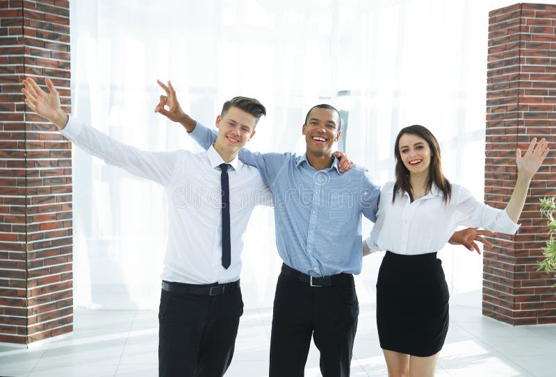Cheering Business Team in the Background of the Office Stock Photo ...