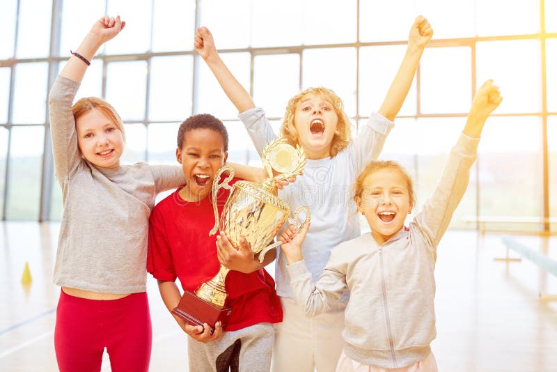Children Cheering in Gym of School Stock Image - Image of cheerful ...