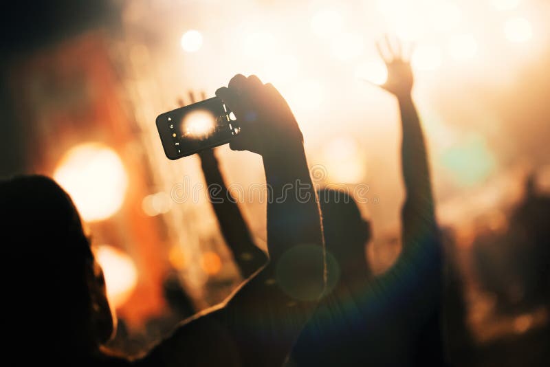 Cheering Crowd at Concert Enjoying Music Performance Stock Photo ...