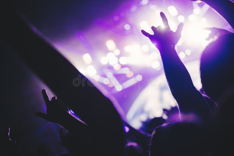 Cheering Crowd at Concert Enjoying Music Performance Stock Image ...