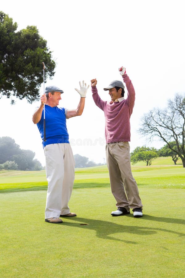 Cheering golfing friends stock photo. Image of hobby - 50486464