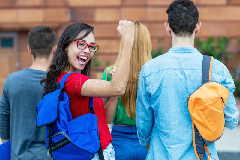 Cheering Italian Female Student with Group of Other Students Stock ...
