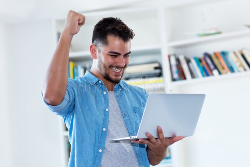 Cheering Mexican Hipster Man with Beard and Computer Stock Image ...