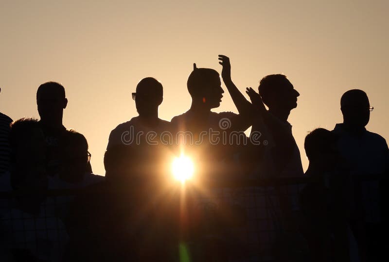 Cheering Silhouettes at Sunset Stock Photo - Image of hand, glasses ...