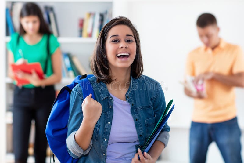 Cheering Spanish Female Student with Group of Students Stock Image ...
