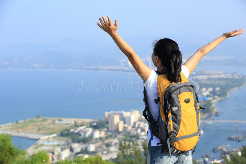 Cheering woman hiker stock photo. Image of backpack, black - 49225498