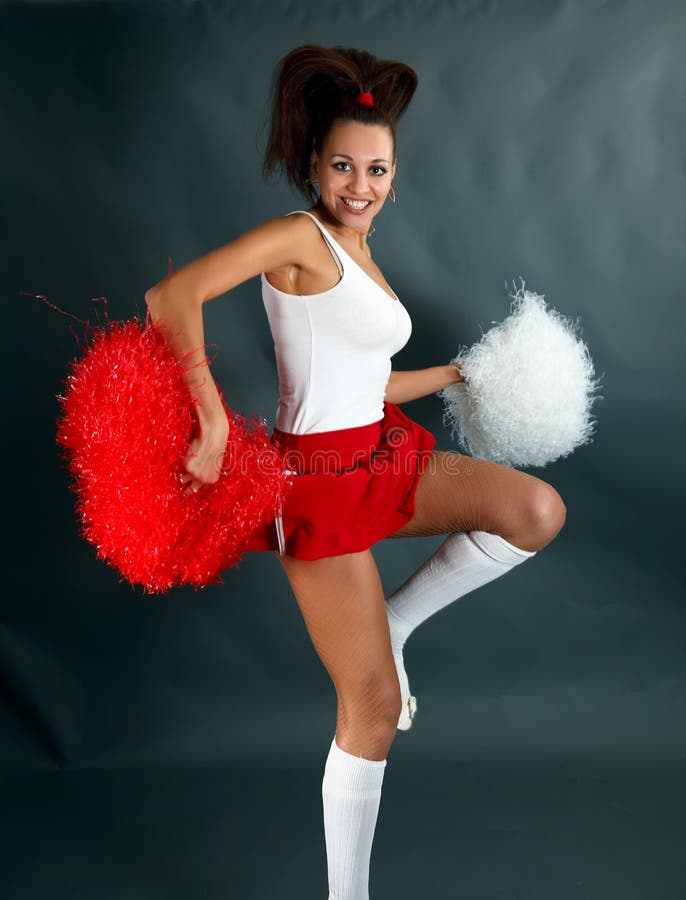 Cheerleader in Orange Costume Stock Photo - Image of sensuality ...