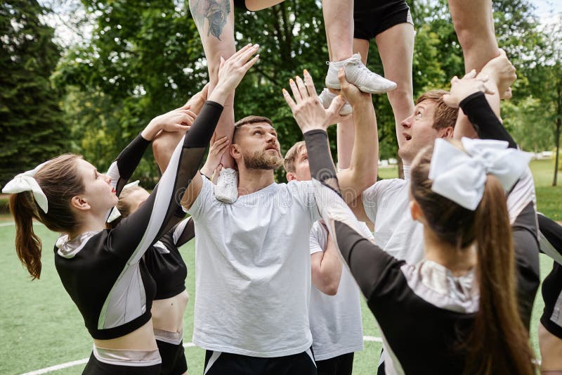 Cheerleader Team Training Together Outdoors Stock Image - Image of ...