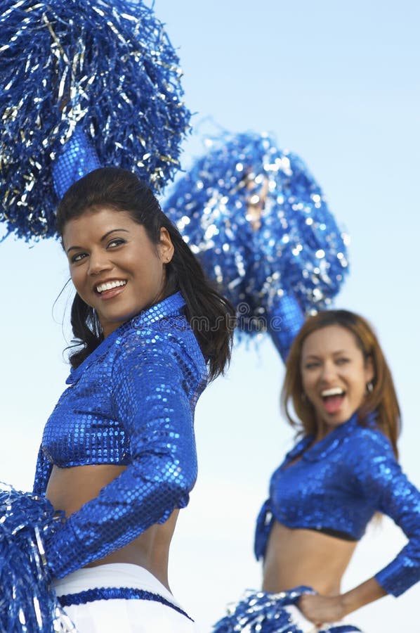 Cheerleaders Cheering in Blue Uniform Stock Image - Image of female ...