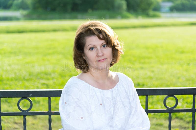 Cheerless Woman in Park on a Bench Stock Image - Image of positive ...