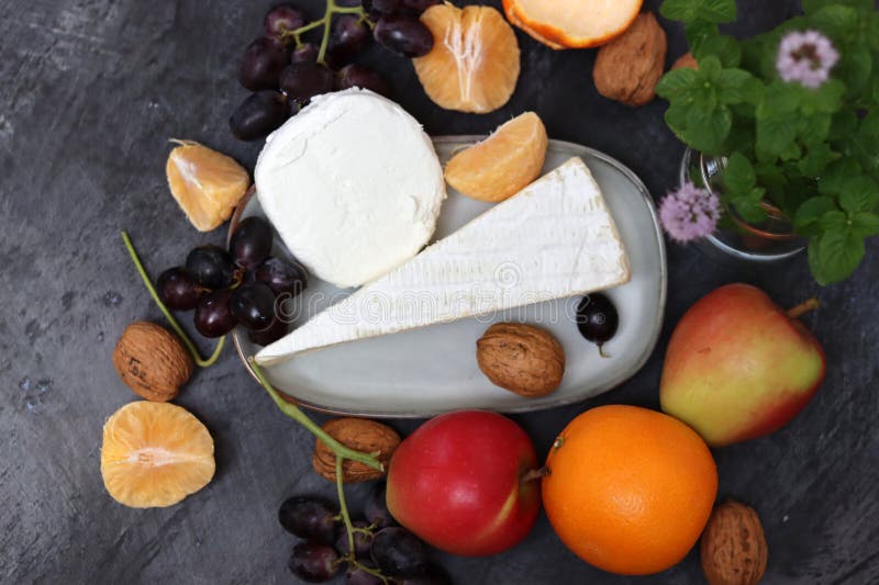 Cheese and Autumn Fruit on a Plate Stock Photo - Image of food ...