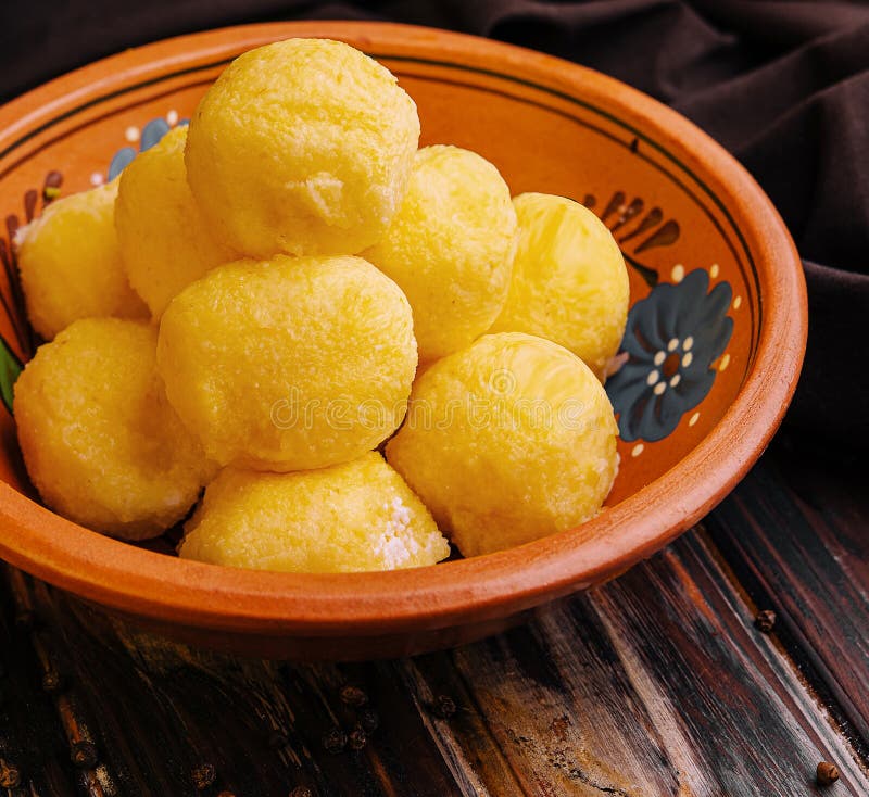 Cheese Balls with Garlic Inside in Bowl Stock Photo - Image of sphere ...