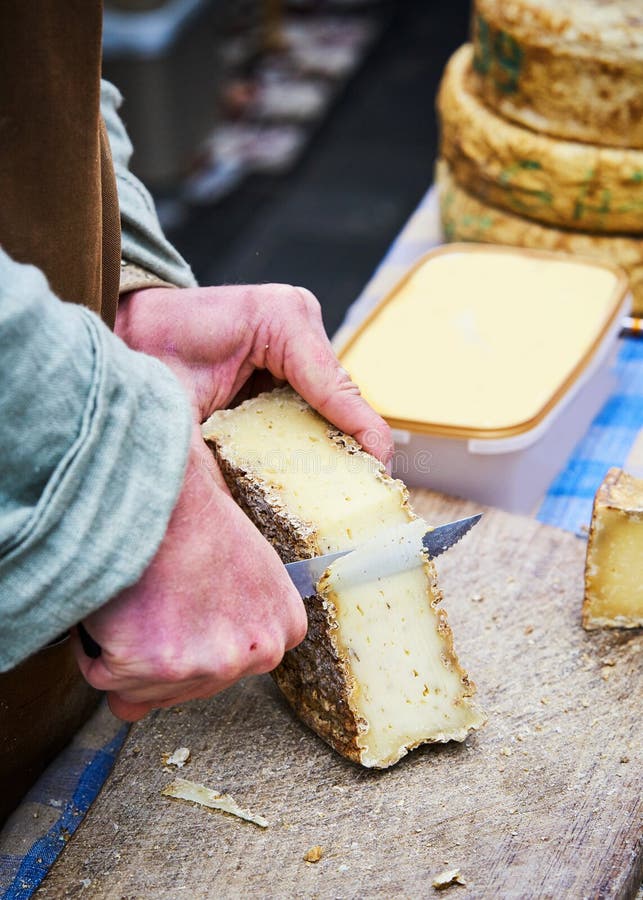 Cheese Being Cut into Slices Stock Image - Image of cuisine, hand: 81163379