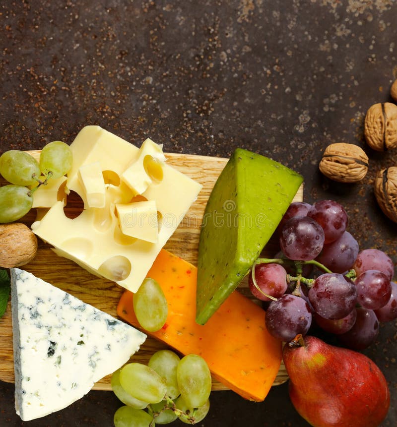 Cheese Board Assorted Cheeses Stock Photo - Image of gouda, cheeses ...