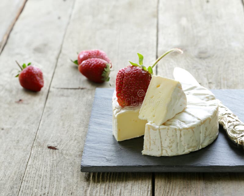 Cheese board with fruit stock photo. Image of cheese - 286141922