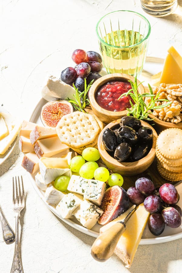 Cheese Board Various Cheese Olives,Figs Fruits, Grapes, Wine and Nuts ...